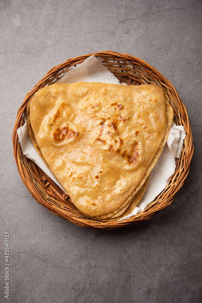 Triangle shape parantha or paratha is an Indian flat bread made with ...
