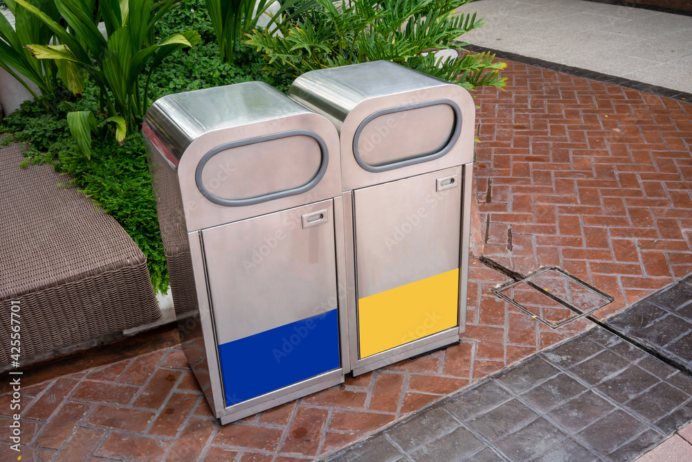Stainless steel general and recycle waste bins in public space. Stock ...