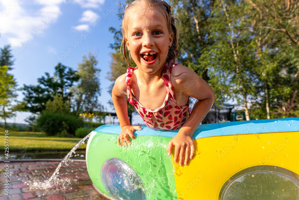 Cute adorable playful caucasian blond kid girl enjoy having fun ...