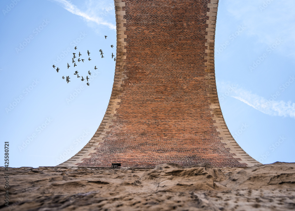 Vertical old railway arch viaduct bridge made of stone and brick ...