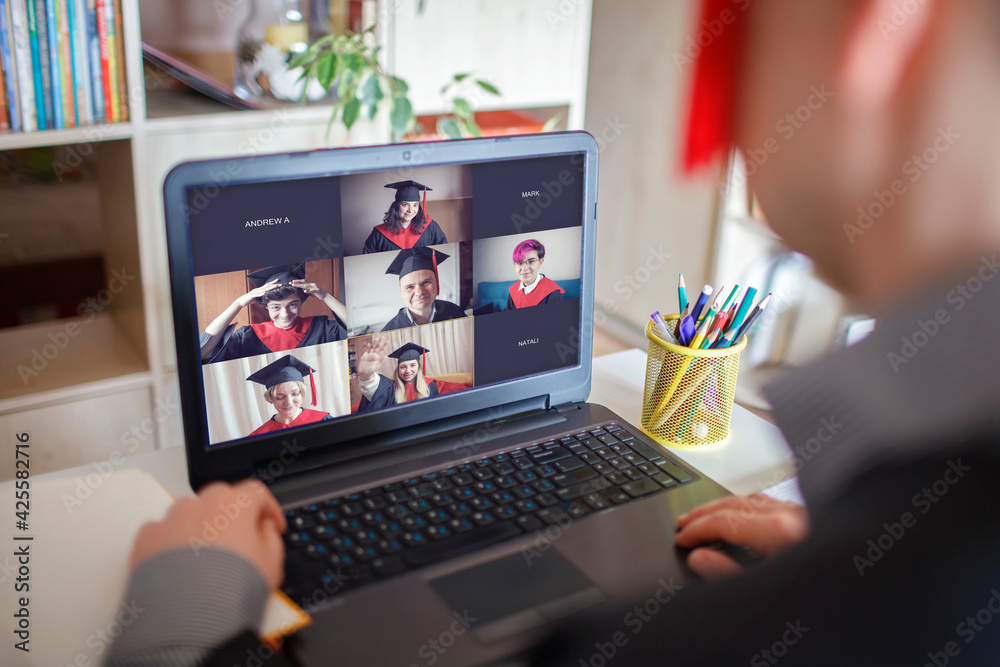 Virtual graduation and convocation ceremony. Laptop screen with happy ...