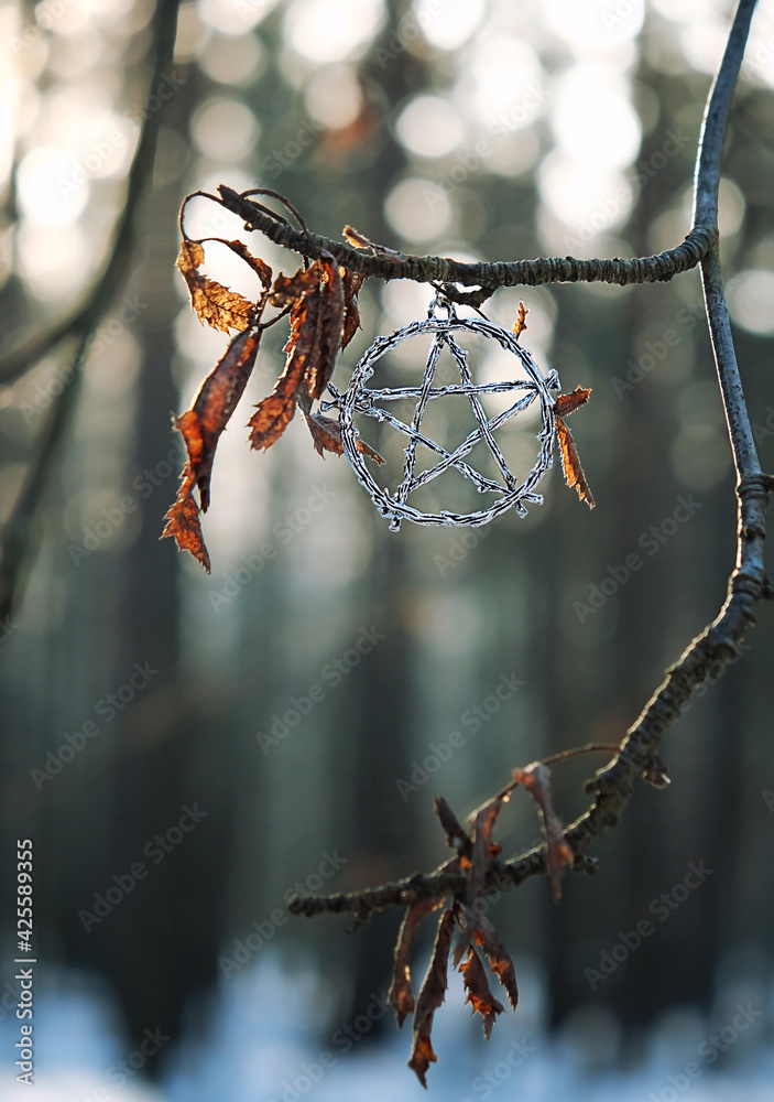 Magic esoteric pentagram amulet in autumn forest. Black magic ritual ...