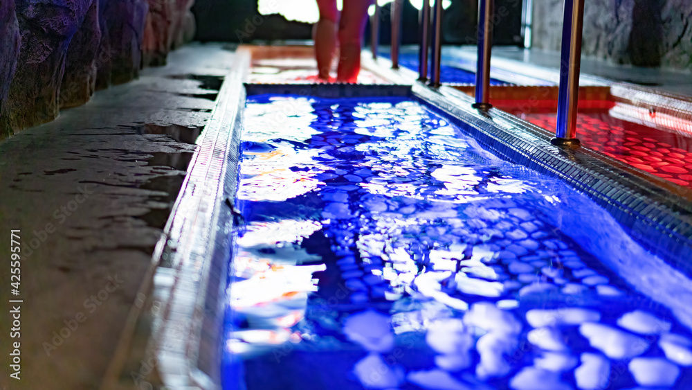 Kneipp walking therapy in hot and cold water in spa wellness center ...