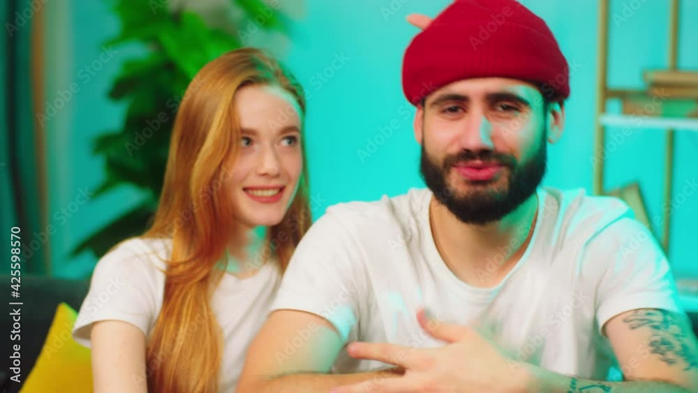 Attractive handsome couple very funny in front of the camera make fun ...