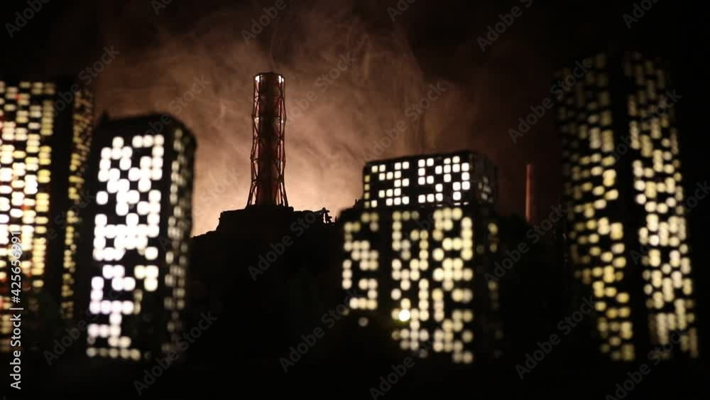 Creative artwork decoration. Chernobyl nuclear power plant at night ...