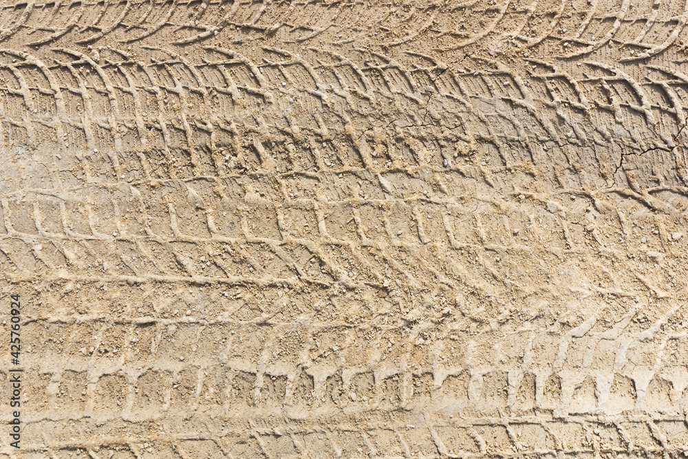 Sand tyre mark background. Tire track shape. Trail lines on dry brown ...