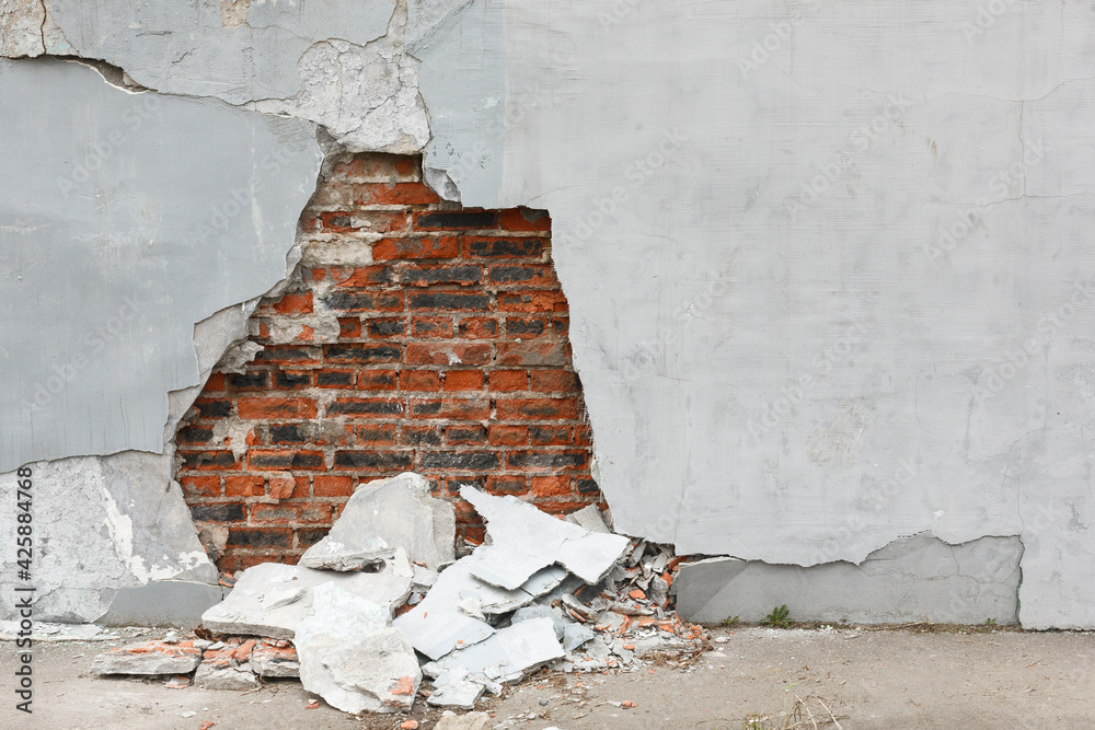 old broken brick wall in cracks Stock Photo | Adobe Stock
