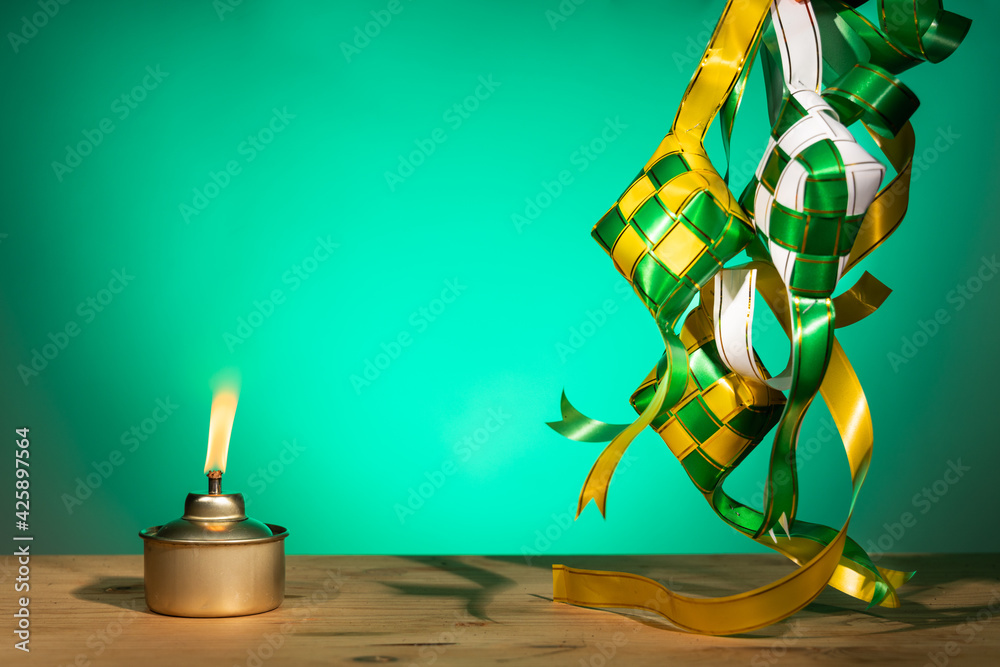 Conceptual traditional Malay oil lamp named pelita with decorative ...