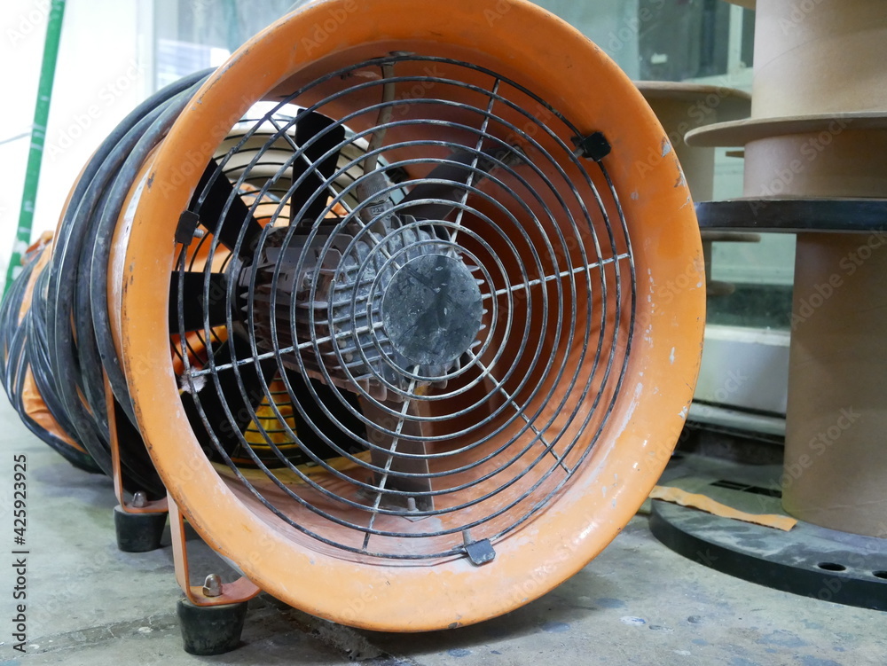exhaust fan or portable ventilation fan at construction site. Stock ...