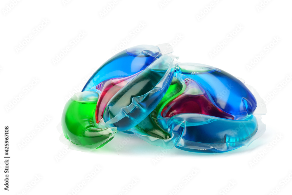 capsules with washing powder isolated on white. liquid powder gel ...