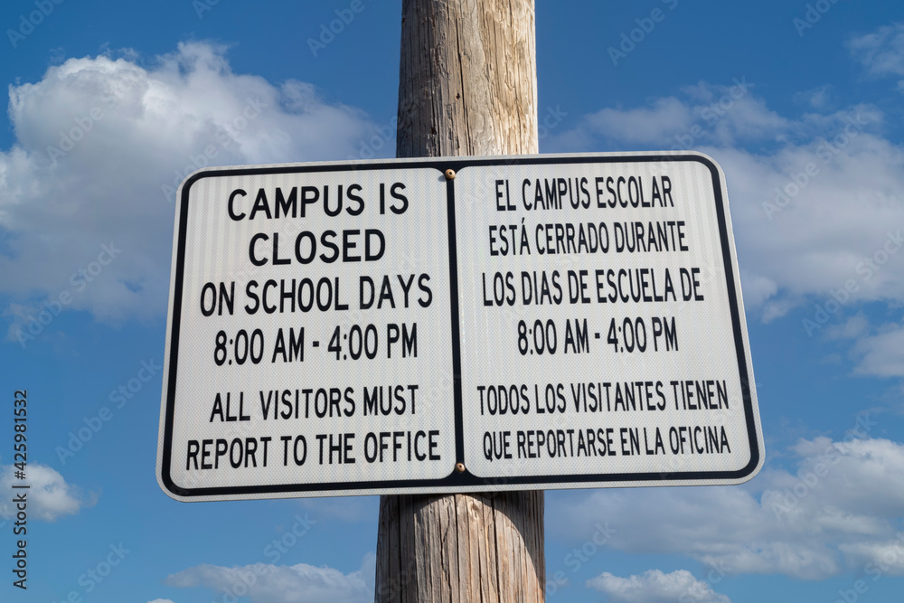 Campus is Closed On School Days sign, in both English and Spanish ...