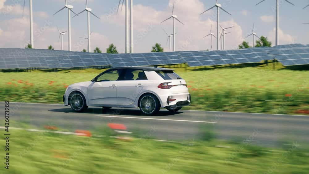 Generic autonomous electric car driving through a vibrant green ...