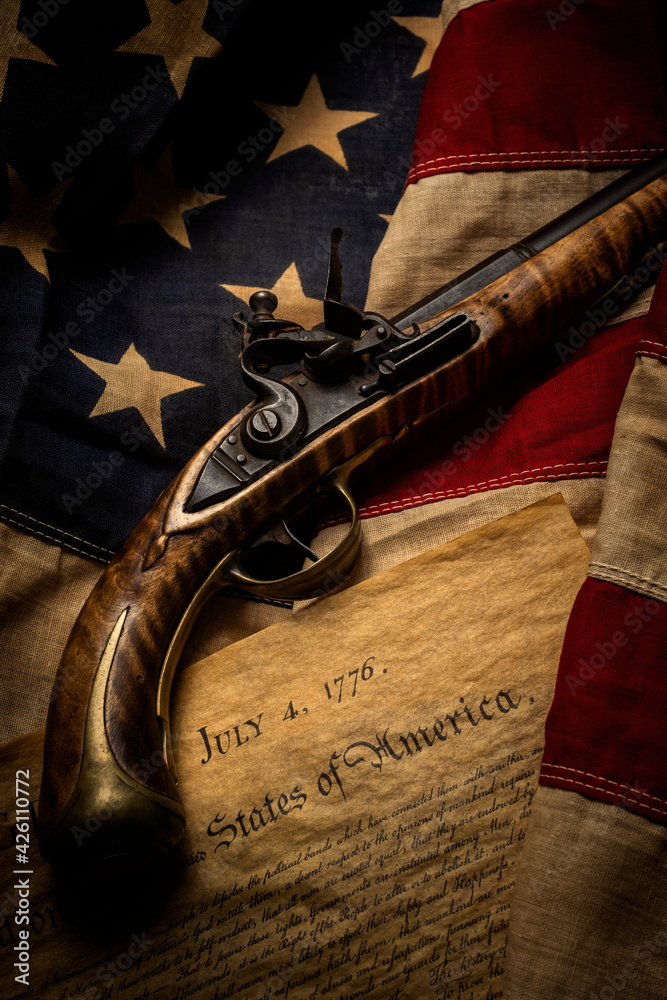 Flintlock pistol with American flag and Declaration of Independence ...