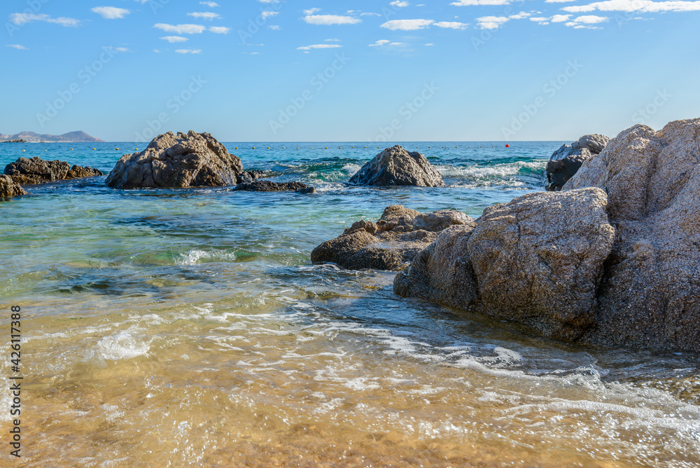 Playa el Chileno Beach, Cabo San Lucas, Mexico. Different stages of the ...