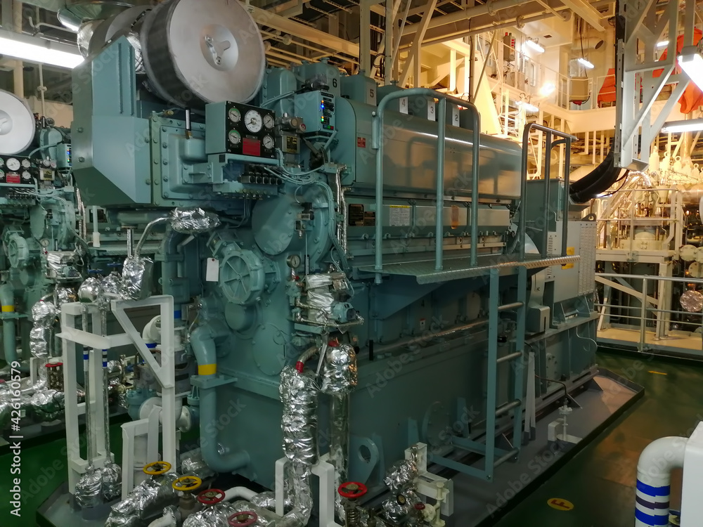 Inside engine room on big ship, Engine room interior of a big ocean ...