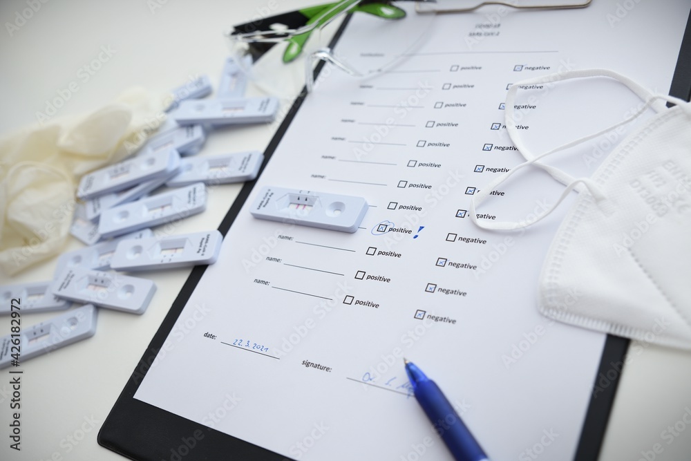 filling coronavirus test form. COVID-19 test. positive rapid antigen ...