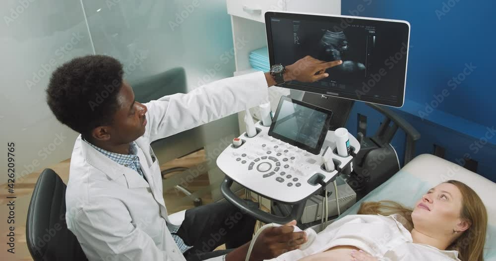 Ultrasound concept. Top angle view of young Caucasian pregnant woman ...