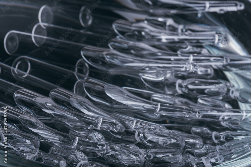 Glass medical ampoule vial for injection. Medicine is liquid sodium ...