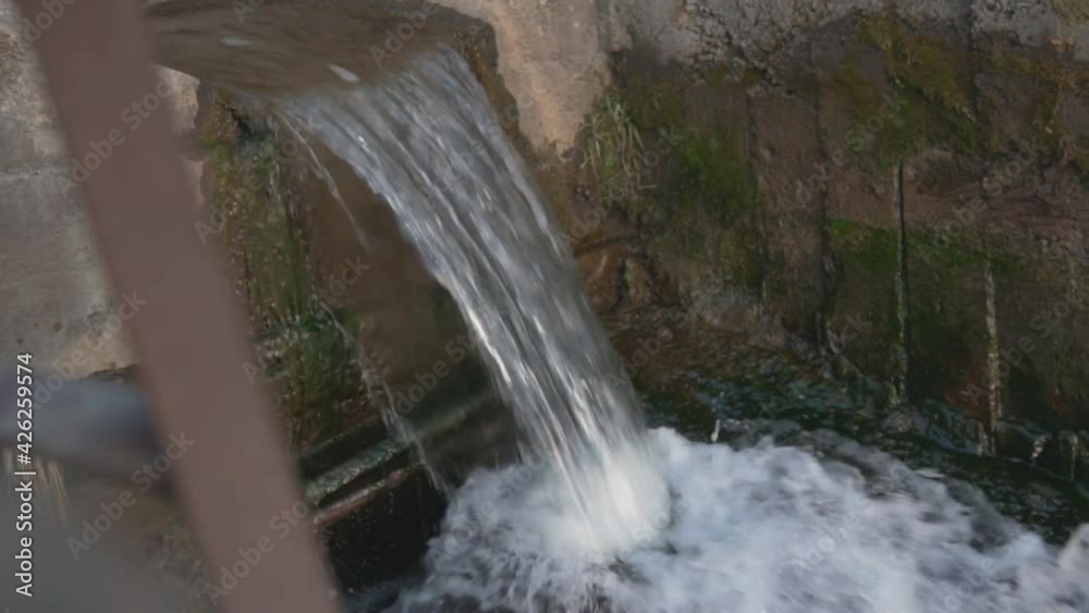 Water runoff gutter. City water disposal drain pipe and waste dirty ...