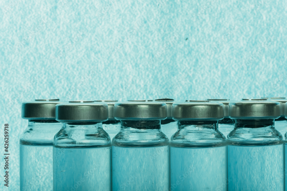 Glass medical ampoule vial for injection. Medicine is liquid sodium ...