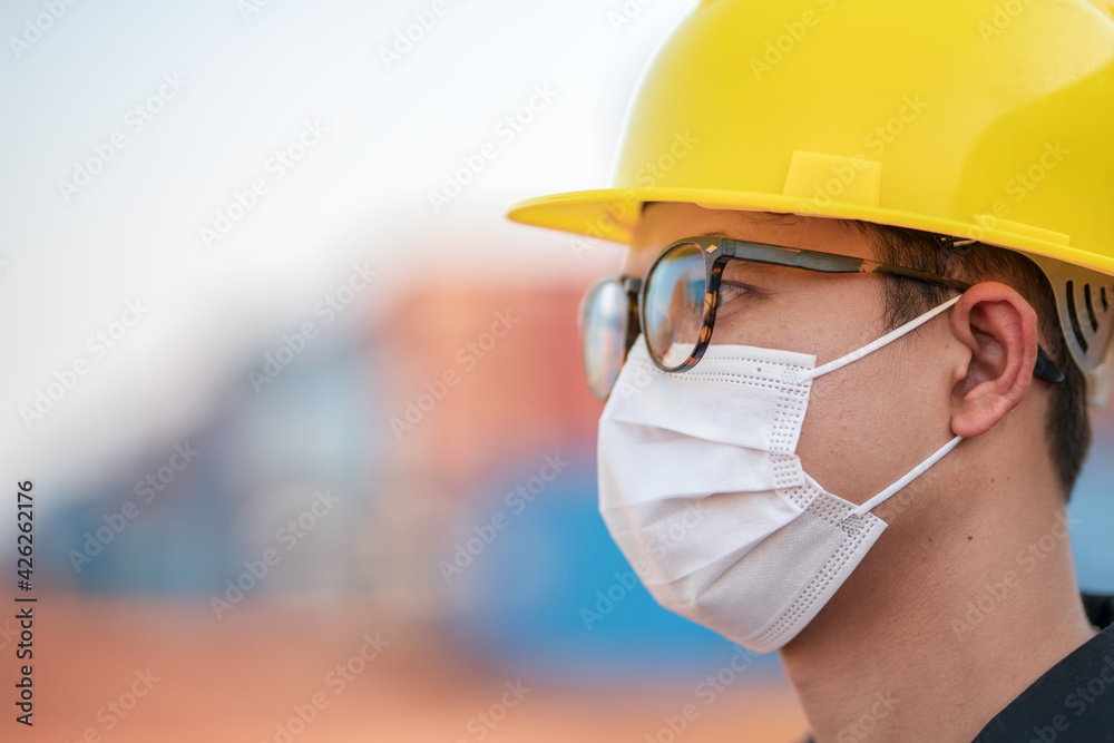 Closs up engineers managers or businessmen Wear a safety helmet and ...