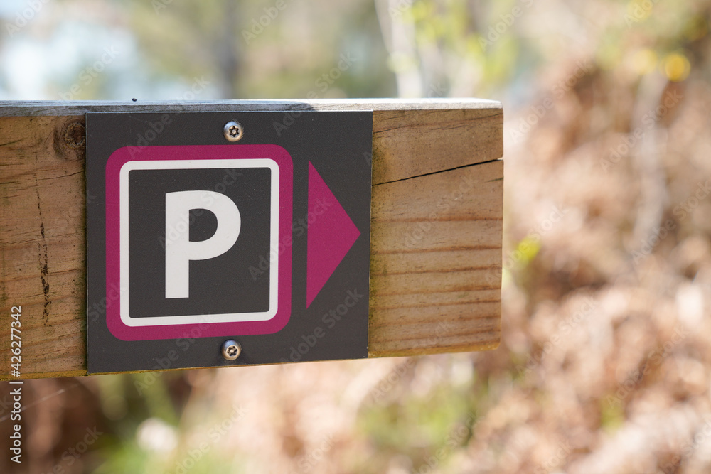 wooden car park directional sign with an arrow to parking vehicle Stock ...
