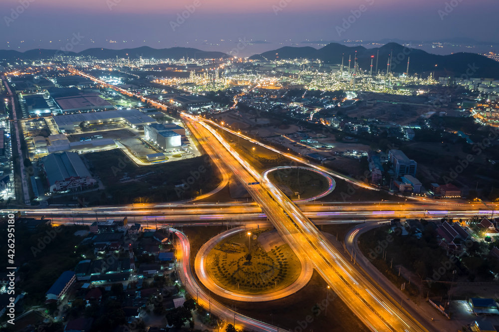 free way and intersection ring road at night city and refinery ...