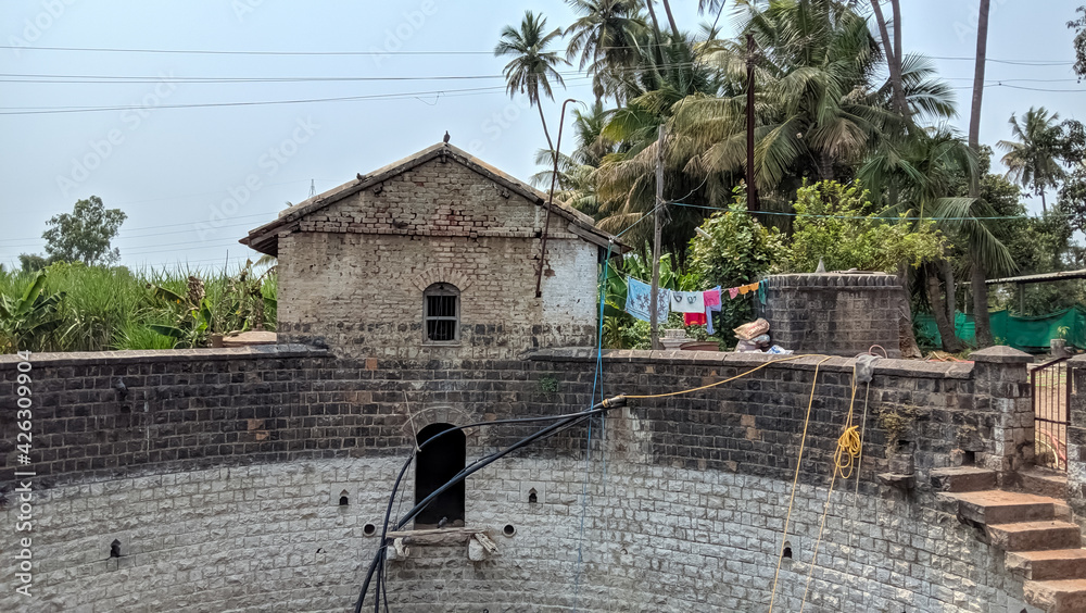 Old beautiful and unique architecture in rural India in farm beside ...