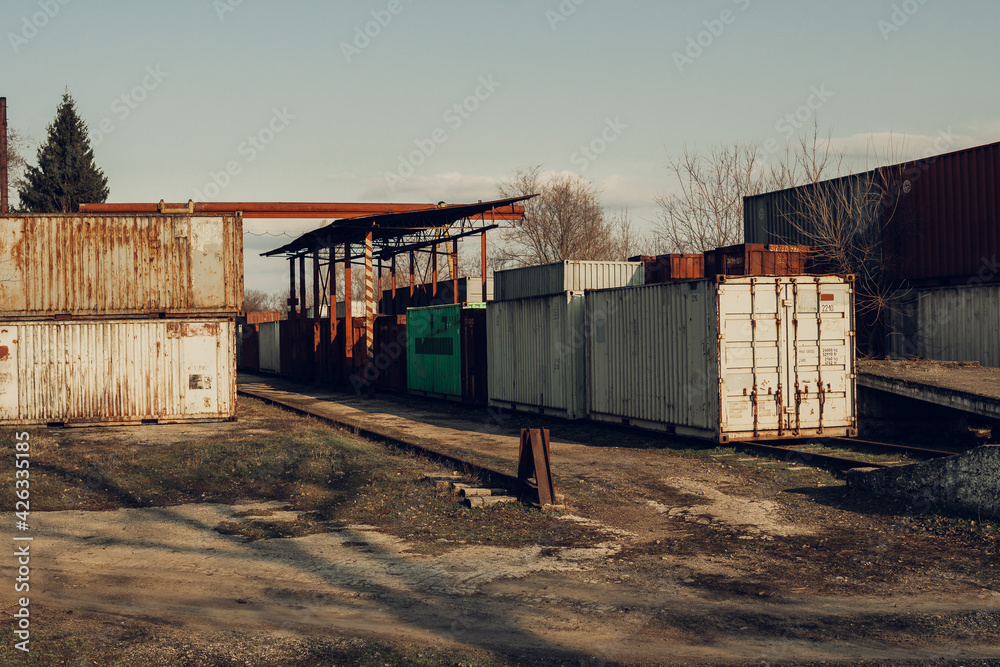 railroad, freight containers in the port on the railroad. cargo sorting ...