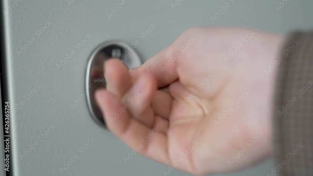 The Guy Inserts the Key into the Door Lock and Opens the Door to the ...