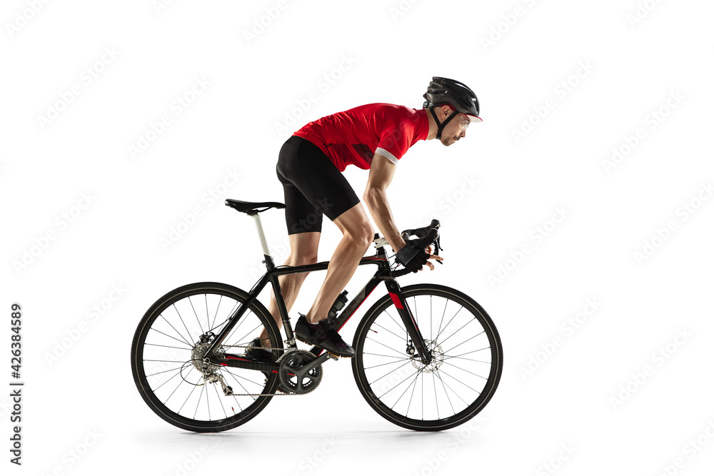Professional male bike rider with road bike isolated over white ...