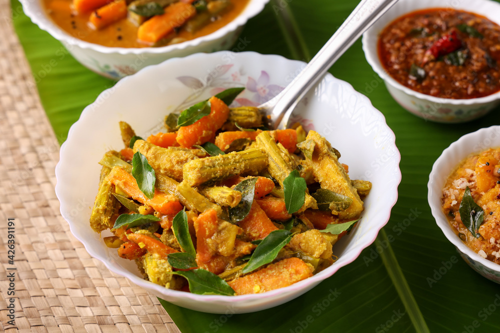 Aviyal curry for Onam Sadhya mixed vegetable curry with grated coconut ...