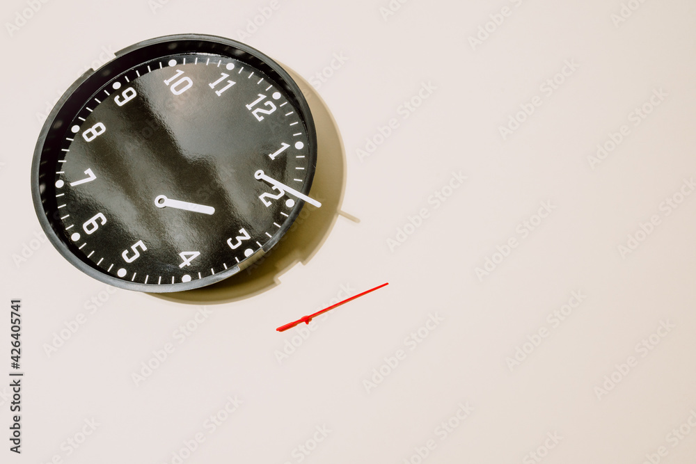 Broken clock on studio background with copyspace Stock Photo | Adobe Stock