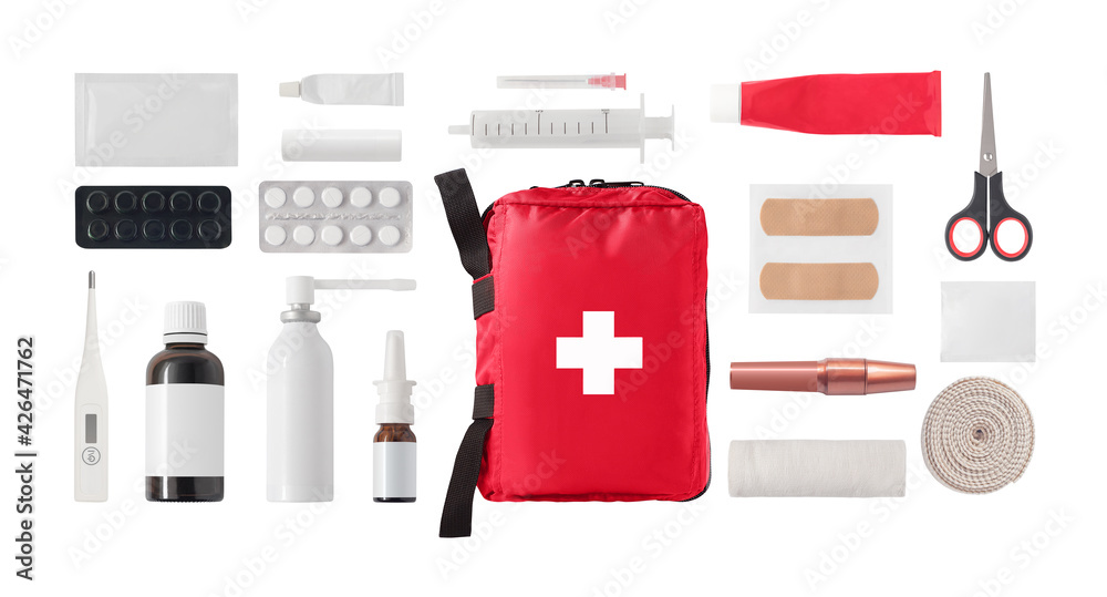Flat lay of medical first aid kit with medicine, drugs and bandages ...