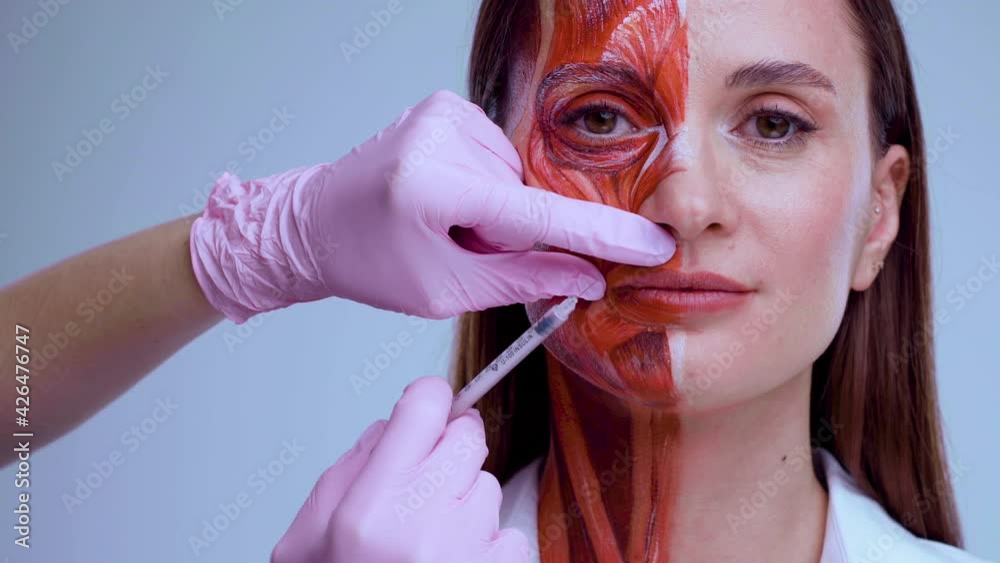 Cosmetic injection in the face. Young woman with half of face with ...