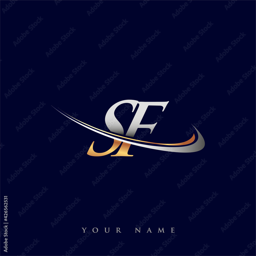 SF initial logo company name colored gold and silver swoosh design ...