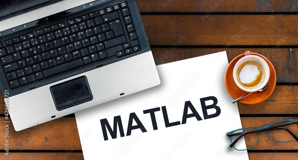 MATLAB programming language. Word Matlab on paper and laptop foto de ...