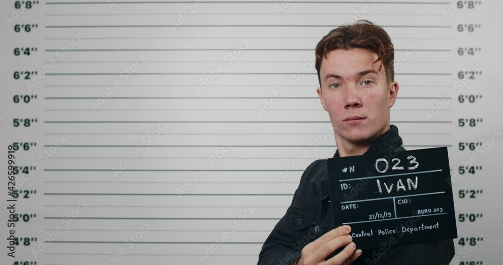 Video „Side profile mugshot of male person with red hair turning head ...