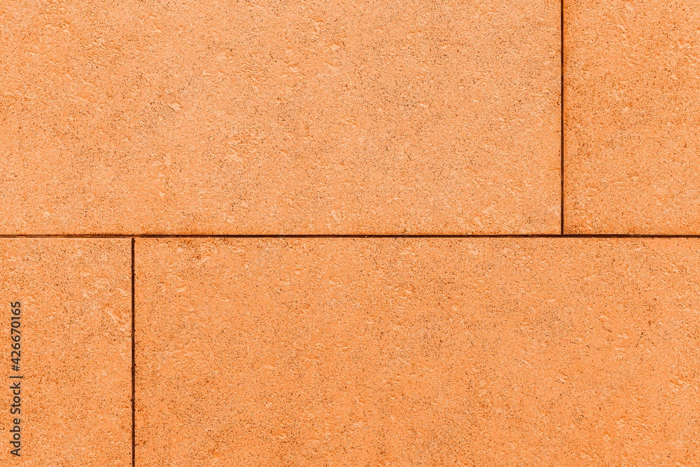 Building exterior brown granite block wall texture and background ...