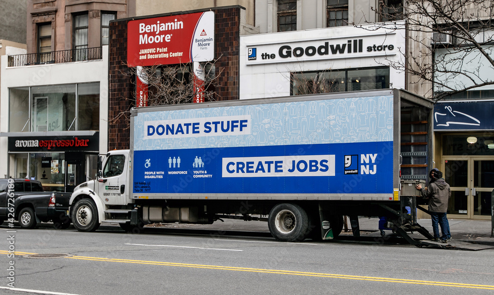 Goodwill truck is parked for unloading in front of their store in ...