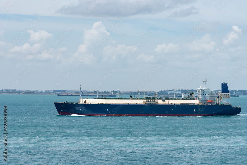 Gas tanker ship, LNG ship, arriving to gas terminal in port of ...