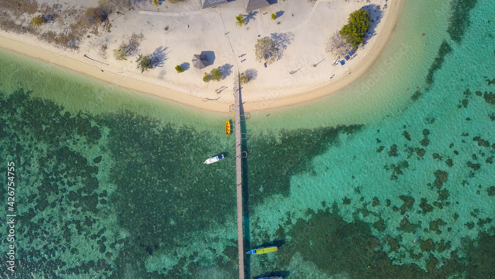 little island with a jetty in labuan bajo, indonesia foto de Stock ...