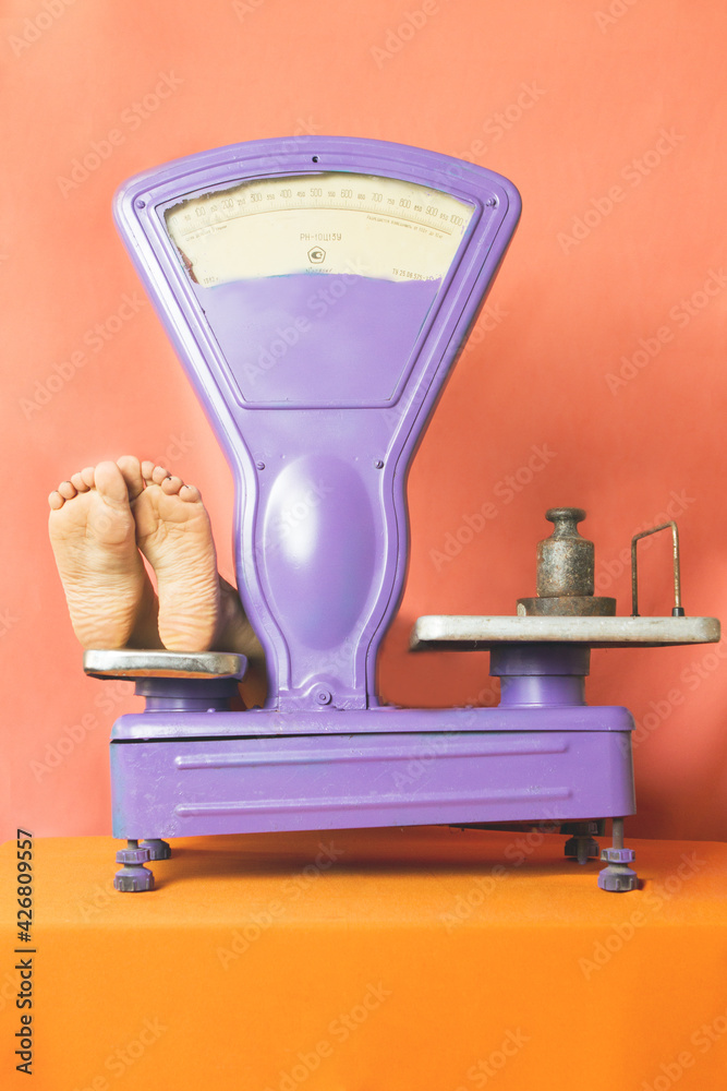 weighing scale on a scale Stock Photo | Adobe Stock