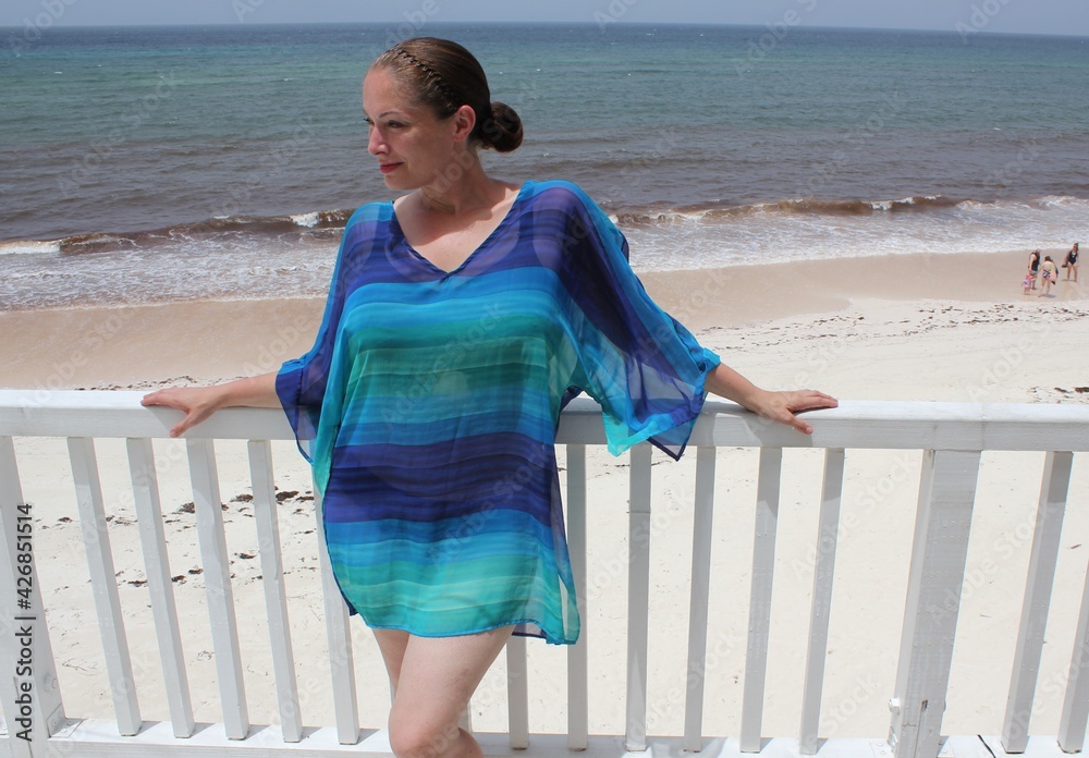 plus size curve woman model on beach resort balcony in swimsuit and ...