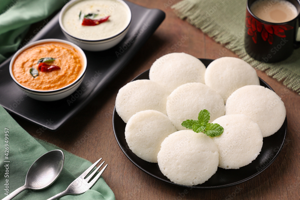 Many Idli or idly popular breakfast of Kerala South India and Sri Lanka ...