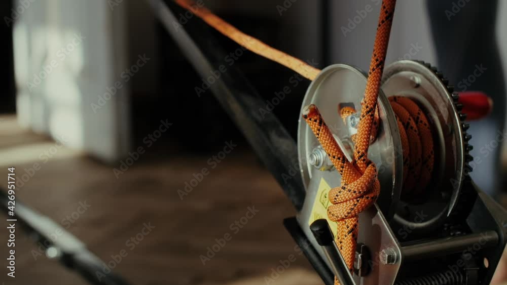 Cable fixing system trainer for stretching in gym raising in air. Rope ...