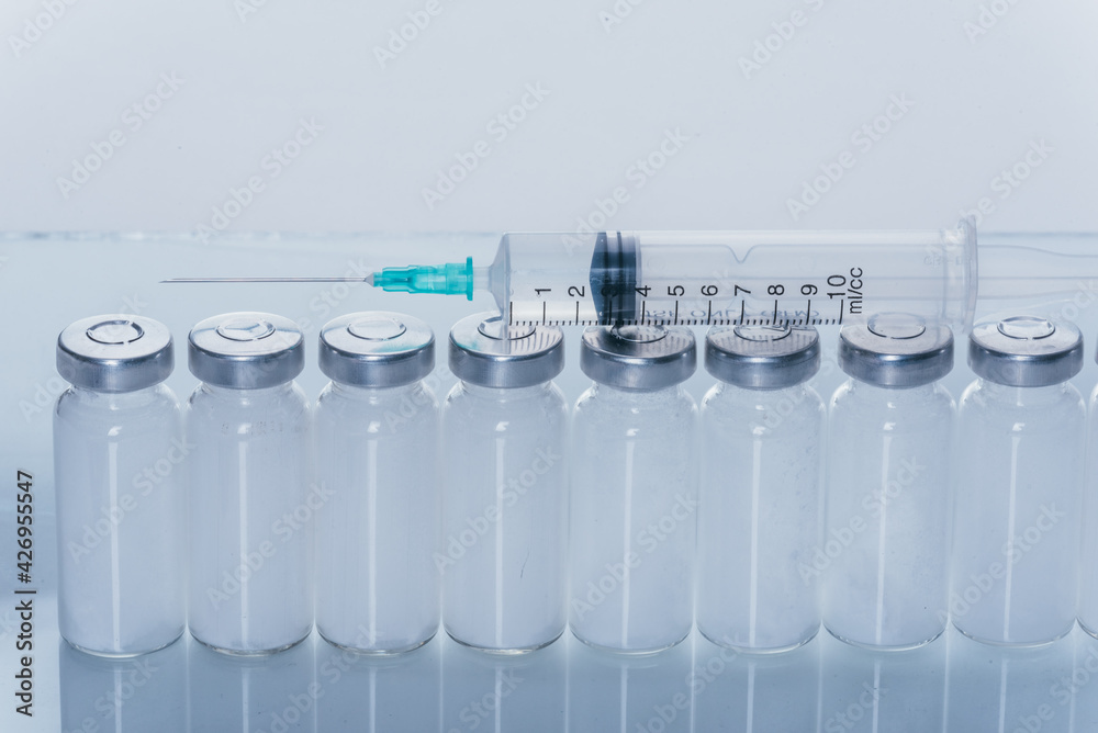 Medicine, Injection, vaccine and disposable syringe, drug concept ...