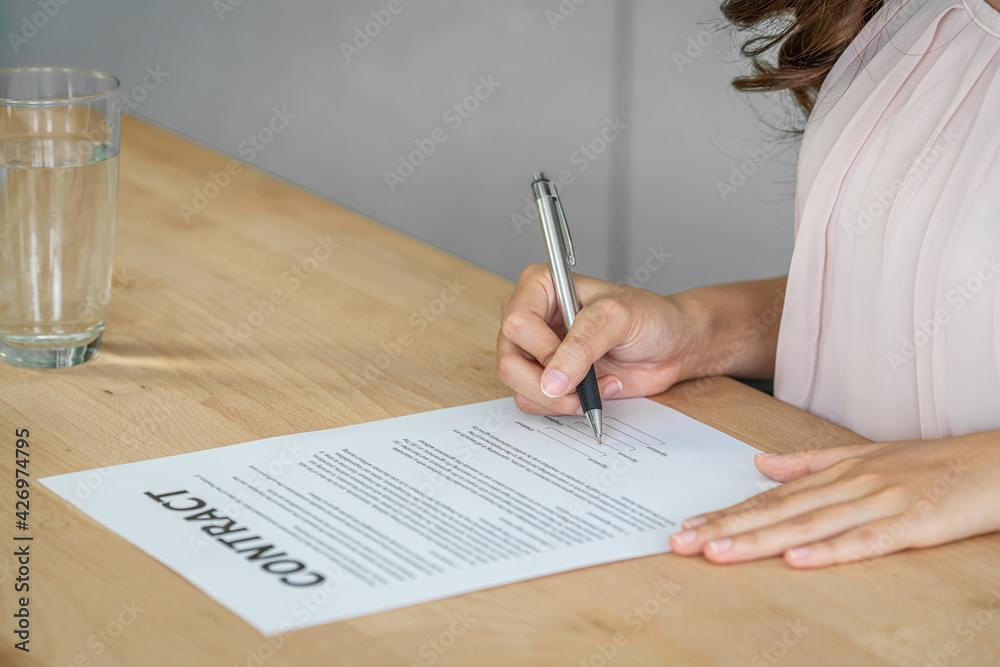 Job interview with signing contract to interviewer Stock Photo | Adobe ...