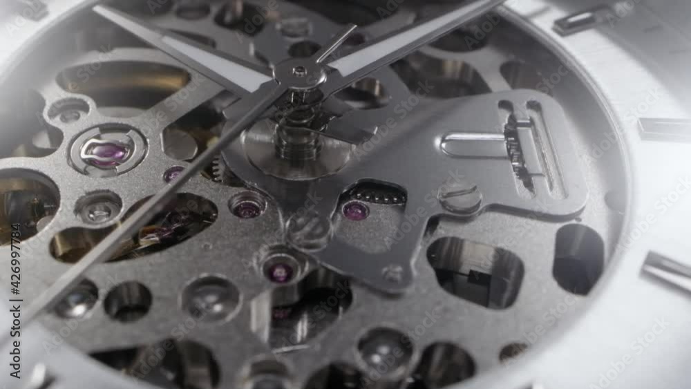 Swiss skeleton silver watch with full open mechanism on clockface ...