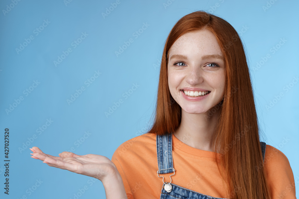 Proud Good Looking Confident Redhead Girl Present Awesome Product Hold Object Palm Raise Hand